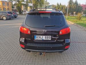 Brown Hyundai Santa Fe 2008 in Vilnius, with an engine capacity of 2.20 L and mileage of 262 thousand km for 2750 €, photo 5 on AUTOMOTO.COM.LV