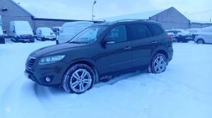 Brūns Hyundai Santa Fe 2010 Tauragė, ar dzinēja tilpumu 2.00 L un nobraukumu 247 tūkst. km par 6500 €, foto  vietnē AUTOMOTO.COM.LV