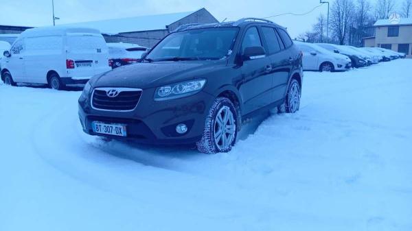 Brown Hyundai Santa Fe 2010 in Taurage, with an engine capacity of 2.00 L and mileage of 247 thousand km for 6500 €, photo 2 on AUTOMOTO.COM.LV