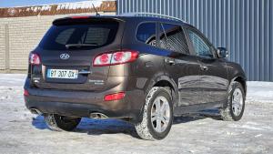 Brūns Hyundai Santa Fe 2010 Tauragė, ar dzinēja tilpumu 2.00 L un nobraukumu 247 tūkst. km par 6200 €, foto 7 vietnē AUTOMOTO.COM.LV