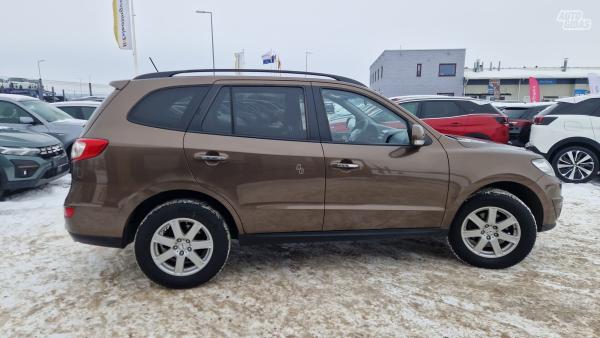 Brūns Hyundai Santa Fe 2011 Marijampole, ar dzinēja tilpumu 2.20 L un nobraukumu 242 tūkst. km par 7690 €, foto 4 vietnē AUTOMOTO.COM.LV