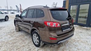Brown Hyundai Santa Fe 2011 in Marijampole, with an engine capacity of 2.20 L and mileage of 242 thousand km for 7690 €, photo 7 on AUTOMOTO.COM.LV