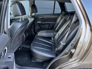 Brown Hyundai Santa Fe 2012 in Riga, with an engine capacity of 2.00 L and mileage of 262 thousand km for 4990 €, photo 9 on AUTOMOTO.COM.LV