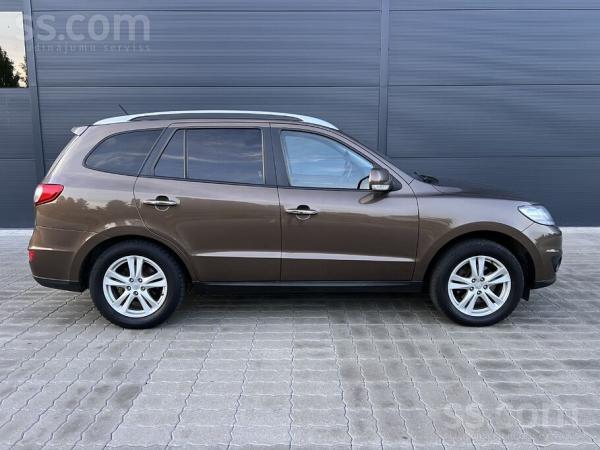 Brūns Hyundai Santa Fe 2012 Rīga, ar dzinēja tilpumu 2.00 L un nobraukumu 262 tūkst. km par 4990 €, foto 10 vietnē AUTOMOTO.COM.LV
