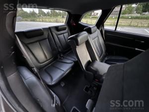 Brown Hyundai Santa Fe 2012 in Riga, with an engine capacity of 2.00 L and mileage of 262 thousand km for 4990 €, photo 16 on AUTOMOTO.COM.LV