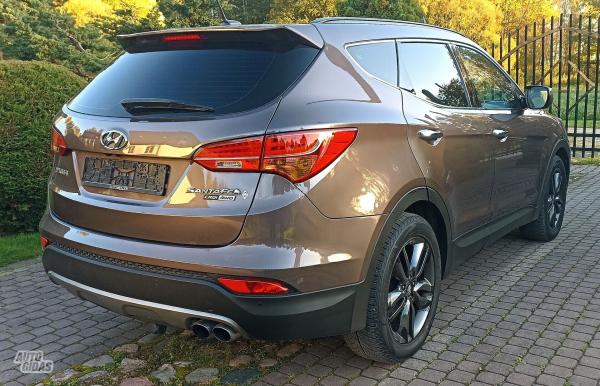 Brūns Hyundai Santa Fe 2013 Tauragė, ar dzinēja tilpumu 2.20 L un nobraukumu 231 tūkst. km par 10800 €, foto 4 vietnē AUTOMOTO.COM.LV