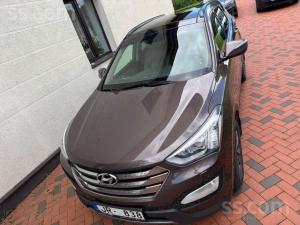 Brūns Hyundai Santa Fe 2014 Bauska, ar dzinēja tilpumu 2.20 L un nobraukumu 286 tūkst. km par 11000 €, foto  vietnē AUTOMOTO.COM.LV