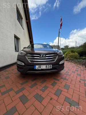 Brūns Hyundai Santa Fe 2014 Bauska, ar dzinēja tilpumu 2.20 L un nobraukumu 286 tūkst. km par 11000 €, foto 3 vietnē AUTOMOTO.COM.LV