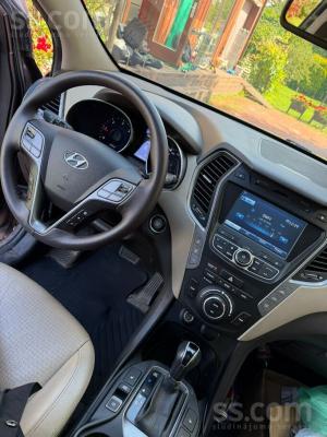 Brūns Hyundai Santa Fe 2014 Bauska, ar dzinēja tilpumu 2.20 L un nobraukumu 286 tūkst. km par 11000 €, foto 6 vietnē AUTOMOTO.COM.LV