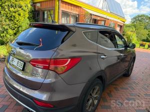 Brūns Hyundai Santa Fe 2014 Bauska, ar dzinēja tilpumu 2.20 L un nobraukumu 286 tūkst. km par 11000 €, foto 7 vietnē AUTOMOTO.COM.LV