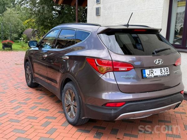 Brūns Hyundai Santa Fe 2014 Bauska, ar dzinēja tilpumu 2.20 L un nobraukumu 286 tūkst. km par 11000 €, foto 7 vietnē AUTOMOTO.COM.LV