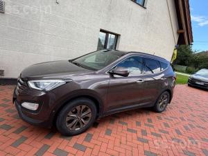 Brūns Hyundai Santa Fe 2014 Bauska, ar dzinēja tilpumu 2.20 L un nobraukumu 286 tūkst. km par 11000 €, foto 9 vietnē AUTOMOTO.COM.LV