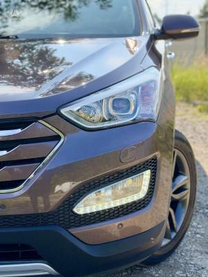 Brūns Hyundai Santa Fe 2014 Šauļi, ar dzinēja tilpumu 2.20 L un nobraukumu 233 tūkst. km par 14450 €, foto 19 vietnē AUTOMOTO.COM.LV