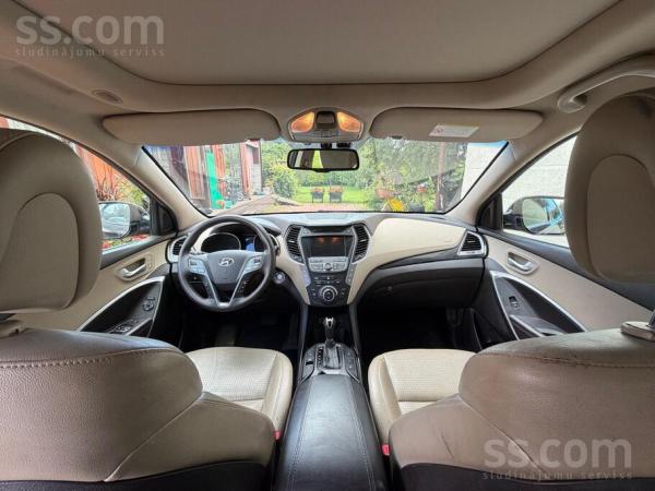 Brown Hyundai Santa Fe 2014 in Bauska, with an engine capacity of 2.20 L and mileage of 286 thousand km for 9500 €, photo 6 on AUTOMOTO.COM.LV
