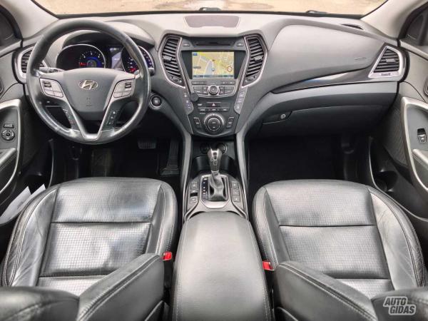 Brown Hyundai Santa Fe 2014 in Siauliai, with an engine capacity of 2.20 L and mileage of 206 thousand km for 10900 €, photo 10 on AUTOMOTO.COM.LV