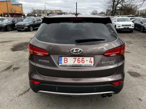 Brūns Hyundai Santa Fe 2015 Rīga, ar dzinēja tilpumu 2.00 L un nobraukumu 261 tūkst. km par 13950 €, foto 8 vietnē AUTOMOTO.COM.LV