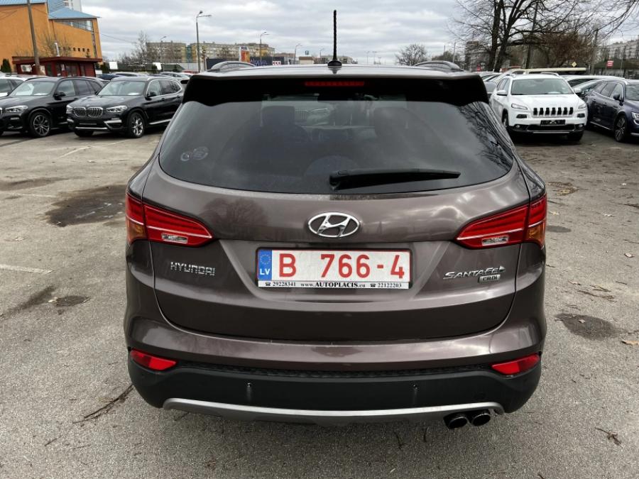 Brūns Hyundai Santa Fe 2015 Rīga, ar dzinēja tilpumu 2.00 L un nobraukumu 261 tūkst. km par 13950 €, foto 8 vietnē AUTOMOTO.COM.LV