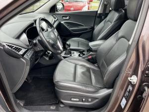 Brūns Hyundai Santa Fe 2015 Rīga, ar dzinēja tilpumu 2.00 L un nobraukumu 261 tūkst. km par 13950 €, foto 40 vietnē AUTOMOTO.COM.LV