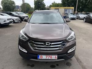 Brūns Hyundai Santa Fe 2015 Rīga, ar dzinēja tilpumu 2.00 L un nobraukumu 261 tūkst. km par 13950 €, foto 41 vietnē AUTOMOTO.COM.LV