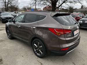 Brūns Hyundai Santa Fe 2015 Rīga, ar dzinēja tilpumu 2.00 L un nobraukumu 261 tūkst. km par 13950 €, foto 42 vietnē AUTOMOTO.COM.LV