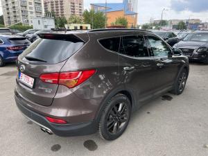 Brūns Hyundai Santa Fe 2015 Rīga, ar dzinēja tilpumu 2.00 L un nobraukumu 261 tūkst. km par 13950 €, foto 46 vietnē AUTOMOTO.COM.LV