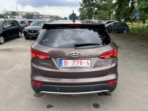 Brūns Hyundai Santa Fe 2015 Rīga, ar dzinēja tilpumu 2.00 L un nobraukumu 261 tūkst. km par 13950 €, foto 47 vietnē AUTOMOTO.COM.LV