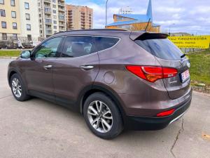 Brūns Hyundai Santa Fe 2015 Rīga, ar dzinēja tilpumu 2.00 L un nobraukumu 261 tūkst. km par 13950 €, foto 64 vietnē AUTOMOTO.COM.LV