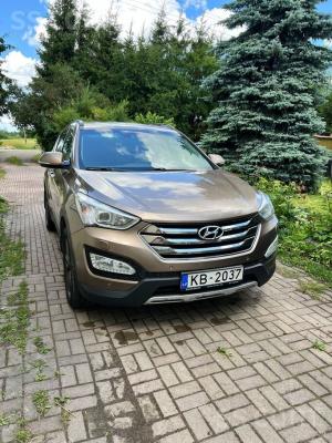 Brown Hyundai Santa Fe 2015 in Jelgava, with an engine capacity of 2.20 L and mileage of 264 thousand km for 10400 €, photo  on AUTOMOTO.COM.LV