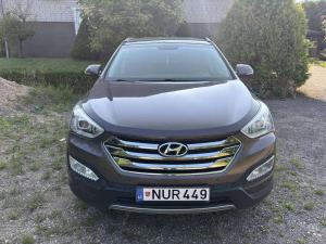Brown Hyundai Santa Fe 2015 in Vilnius, with an engine capacity of 2.20 L and mileage of 201 thousand km for 8960 €, photo  on AUTOMOTO.COM.LV