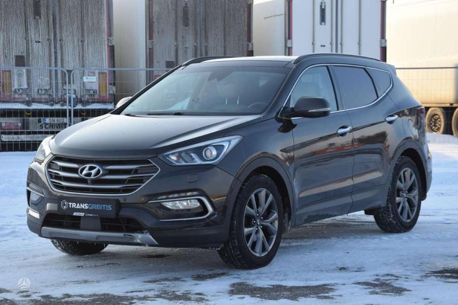 Brown Hyundai Santa Fe 2016 in Vilnius, with an engine capacity of 2.20 L and mileage of 188 thousand km for 13499 €, photo 5 on AUTOMOTO.COM.LV