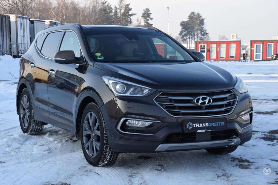 Brown Hyundai Santa Fe 2016 in Vilnius, with an engine capacity of 2.20 L and mileage of 188 thousand km for 13499 €, photo 7 on AUTOMOTO.COM.LV