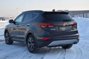 Brown Hyundai Santa Fe 2016 in Vilnius, with an engine capacity of 2.20 L and mileage of 188 thousand km for 13499 €, photo 35 on AUTOMOTO.COM.LV