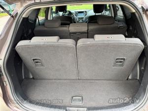 Brown Hyundai Santa Fe 2016 in Tallinn, with an engine capacity of 2.20 L and mileage of 210 thousand km for 13400 €, photo 9 on AUTOMOTO.COM.LV