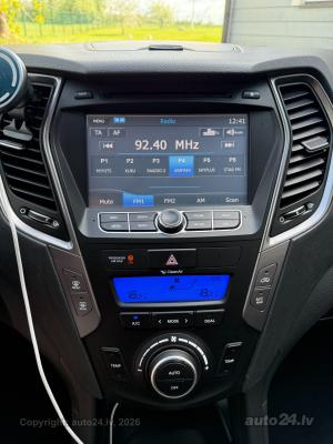 Brown Hyundai Santa Fe 2016 in Tallinn, with an engine capacity of 2.20 L and mileage of 210 thousand km for 13400 €, photo 14 on AUTOMOTO.COM.LV