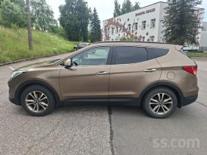 Brūns Hyundai Santa Fe 2016 Limbaži, ar dzinēja tilpumu 2.20 L un nobraukumu 199 tūkst. km par 11500 €, foto  vietnē AUTOMOTO.COM.LV