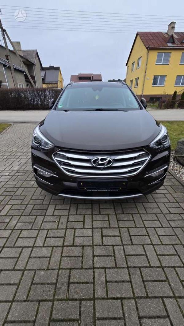 Brown Hyundai Santa Fe 2017 in Marijampole, with an engine capacity of 2.20 L and mileage of 83 thousand km for 15950 €, photo 5 on AUTOMOTO.COM.LV