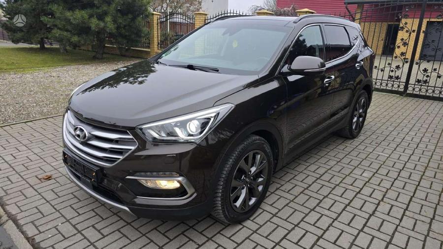 Brown Hyundai Santa Fe 2017 in Marijampole, with an engine capacity of 2.20 L and mileage of 83 thousand km for 15950 €, photo 6 on AUTOMOTO.COM.LV