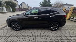Brown Hyundai Santa Fe 2017 in Marijampole, with an engine capacity of 2.20 L and mileage of 83 thousand km for 15950 €, photo 11 on AUTOMOTO.COM.LV