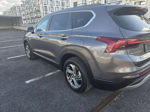 Brown Hyundai Santa Fe 2021 in Vilnius, with an engine capacity of 2.15 L and mileage of 145 thousand km for 18150 €, photo 4 on AUTOMOTO.COM.LV