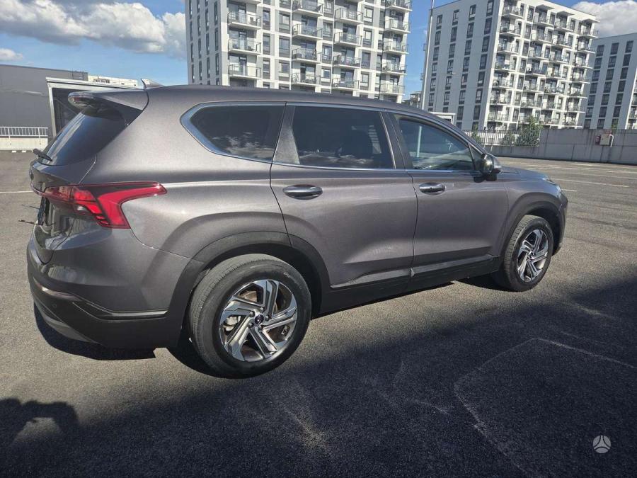 Brown Hyundai Santa Fe 2021 in Vilnius, with an engine capacity of 2.15 L and mileage of 145 thousand km for 18150 €, photo 6 on AUTOMOTO.COM.LV