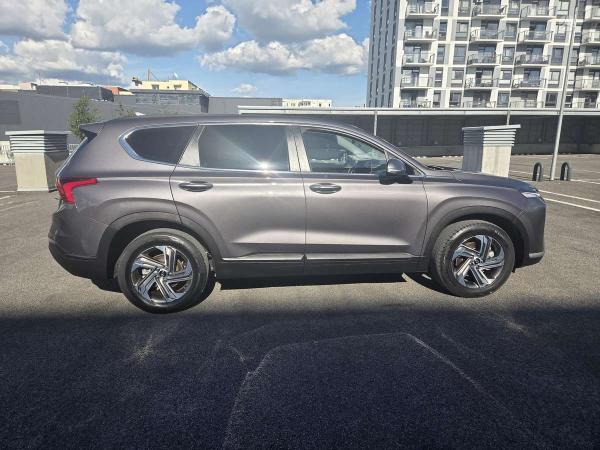 Brown Hyundai Santa Fe 2021 in Vilnius, with an engine capacity of 2.15 L and mileage of 145 thousand km for 18150 €, photo 6 on AUTOMOTO.COM.LV
