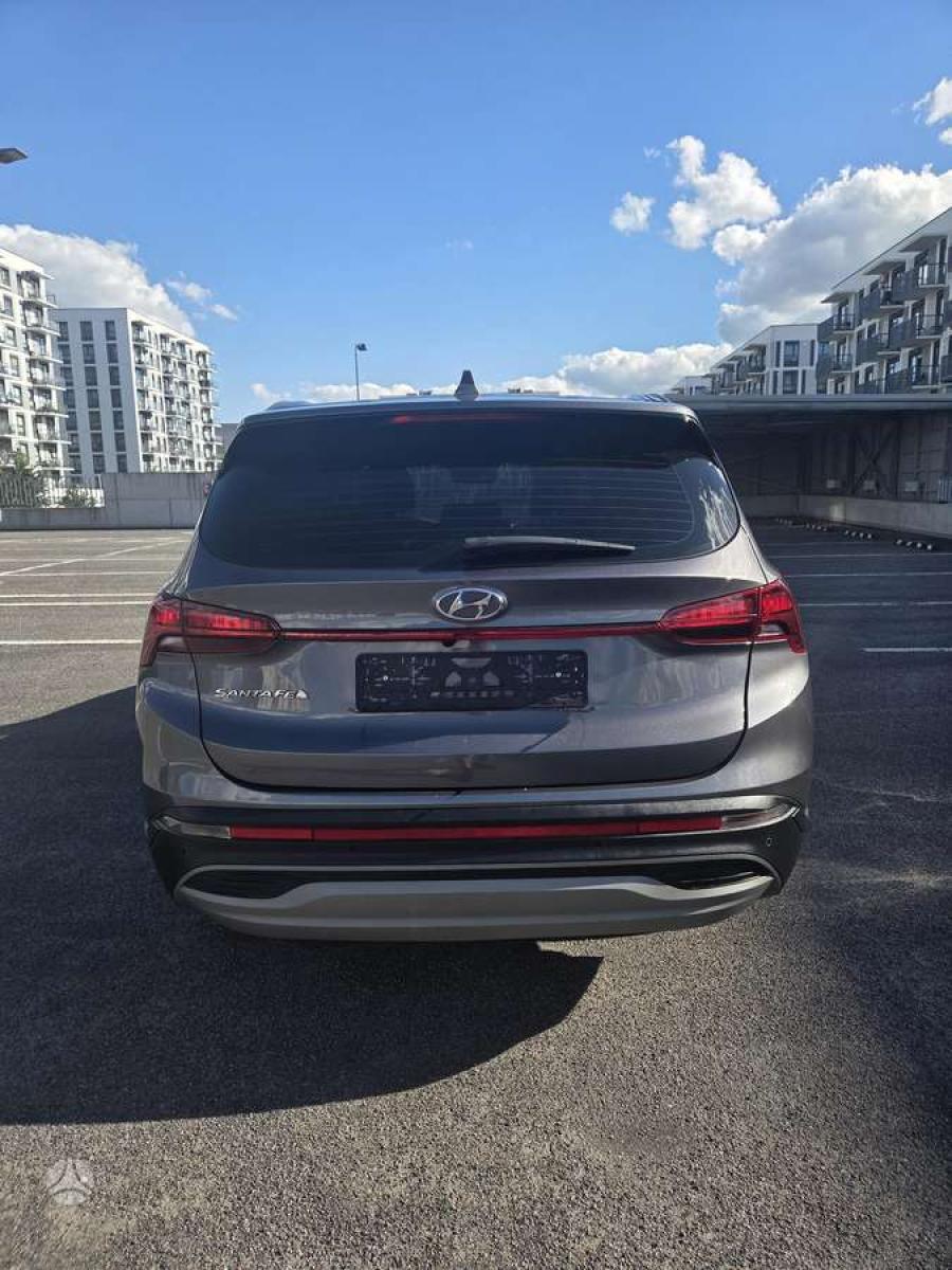 Brown Hyundai Santa Fe 2021 in Vilnius, with an engine capacity of 2.15 L and mileage of 145 thousand km for 18150 €, photo 9 on AUTOMOTO.COM.LV