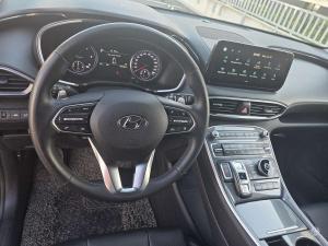 Brown Hyundai Santa Fe 2021 in Vilnius, with an engine capacity of 2.15 L and mileage of 145 thousand km for 18150 €, photo 18 on AUTOMOTO.COM.LV