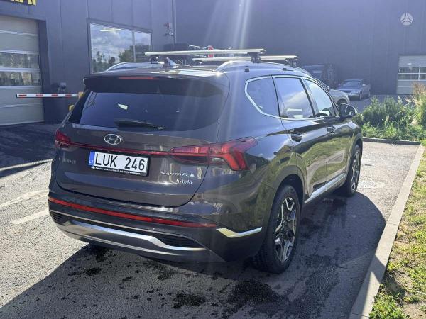 Brūns Hyundai Santa Fe 2021 Viļņa, ar dzinēja tilpumu 1.60 L un nobraukumu 91 tūkst. km par 29900 €, foto 6 vietnē AUTOMOTO.COM.LV