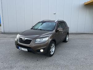 Brūns Hyundai Santa Fe 2011 Tartu, ar dzinēja tilpumu 2.20 L un nobraukumu 308 tūkst. km par 6499 €, foto  vietnē AUTOMOTO.COM.LV