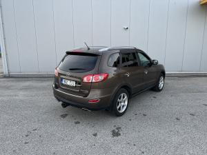Brūns Hyundai Santa Fe 2011 Tartu, ar dzinēja tilpumu 2.20 L un nobraukumu 308 tūkst. km par 6499 €, foto 10 vietnē AUTOMOTO.COM.LV