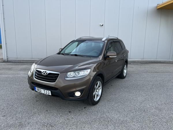 Brown Hyundai Santa Fe 2011 in Tartu, with an engine capacity of 2.20 L and mileage of 308 thousand km for 6499 €, photo 7 on AUTOMOTO.COM.LV