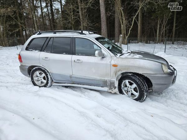 Hyundai Santa Fe 2002 in Prienai, with an engine capacity of 2.40 L and mileage of 312 thousand km for 777 €, photo 3 on AUTOMOTO.COM.LV