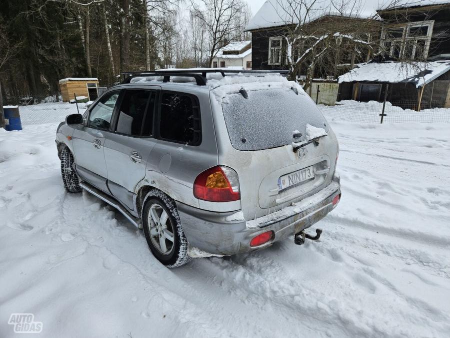 Hyundai Santa Fe 2002 Prienai, ar dzinēja tilpumu 2.40 L un nobraukumu 312 tūkst. km par 699 €, foto 4 vietnē AUTOMOTO.COM.LV