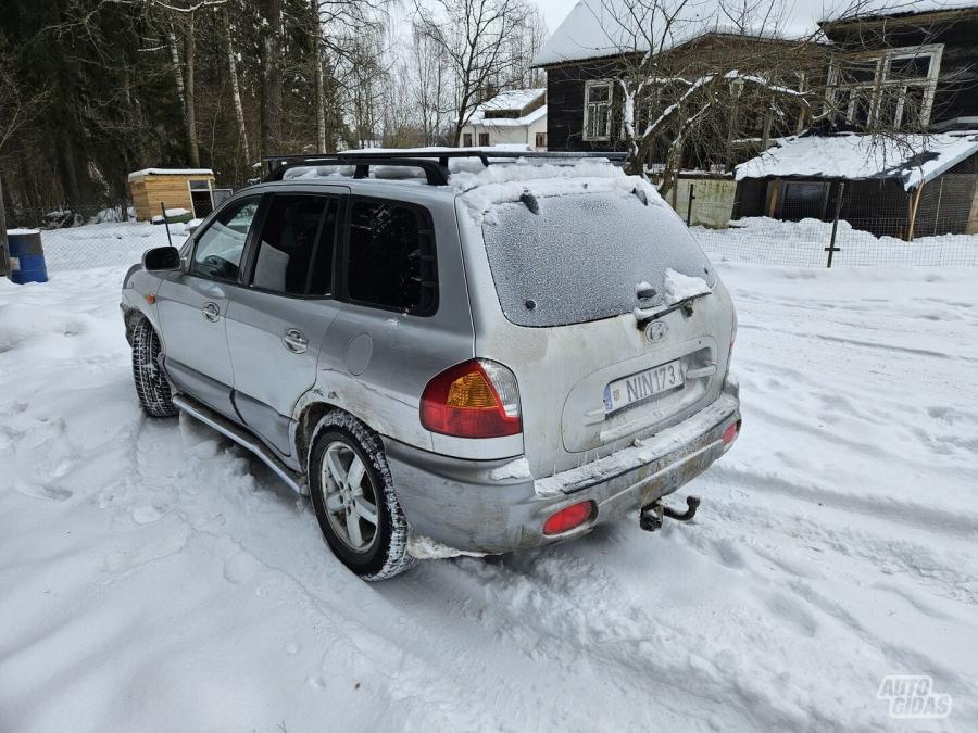 Hyundai Santa Fe 2002 in Prienai, with an engine capacity of 2.40 L and mileage of 312 thousand km for 600 €, photo 5 on AUTOMOTO.COM.LV